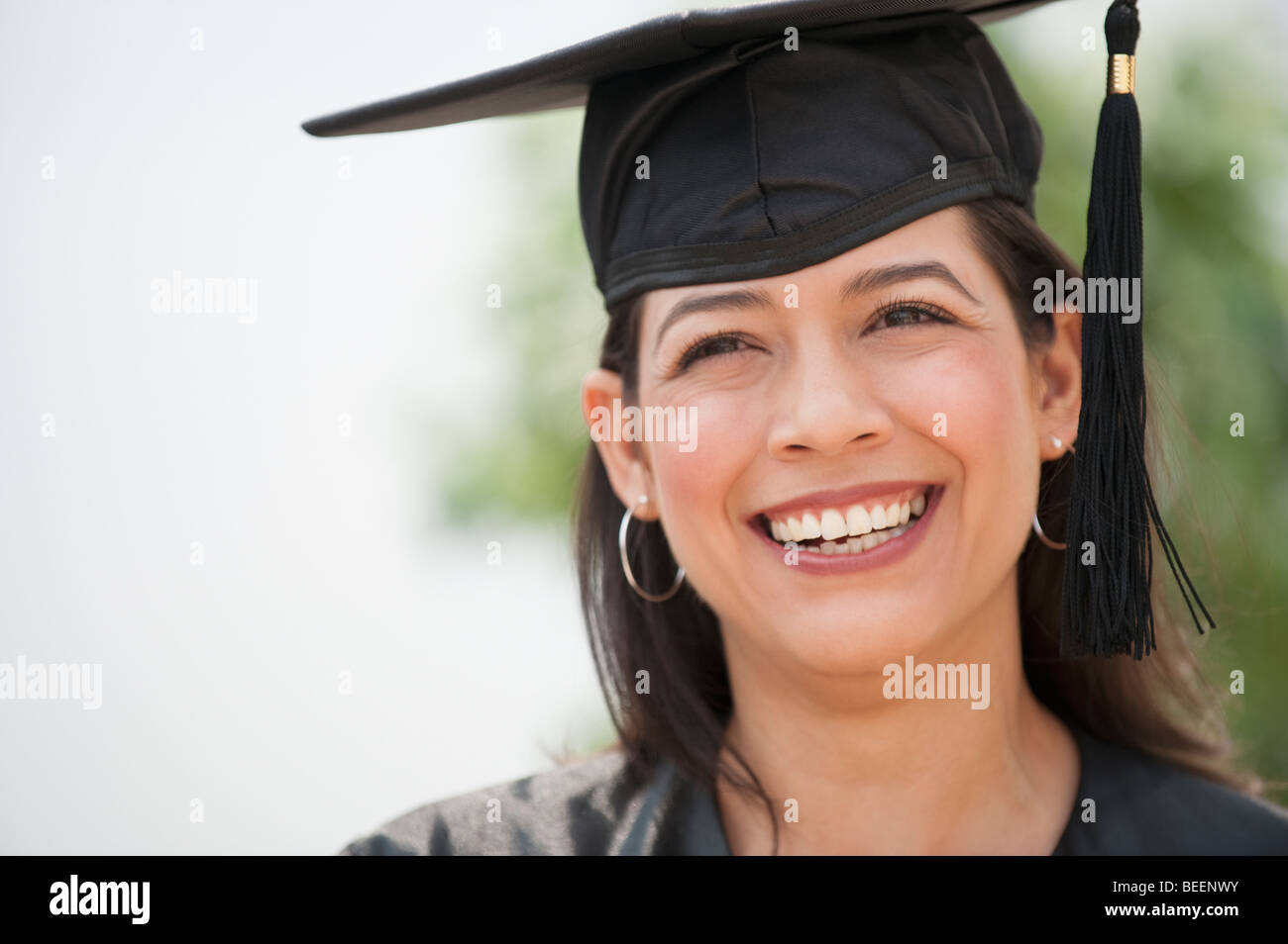 Smiling Hispanic graduate Stock Photo - Alamy