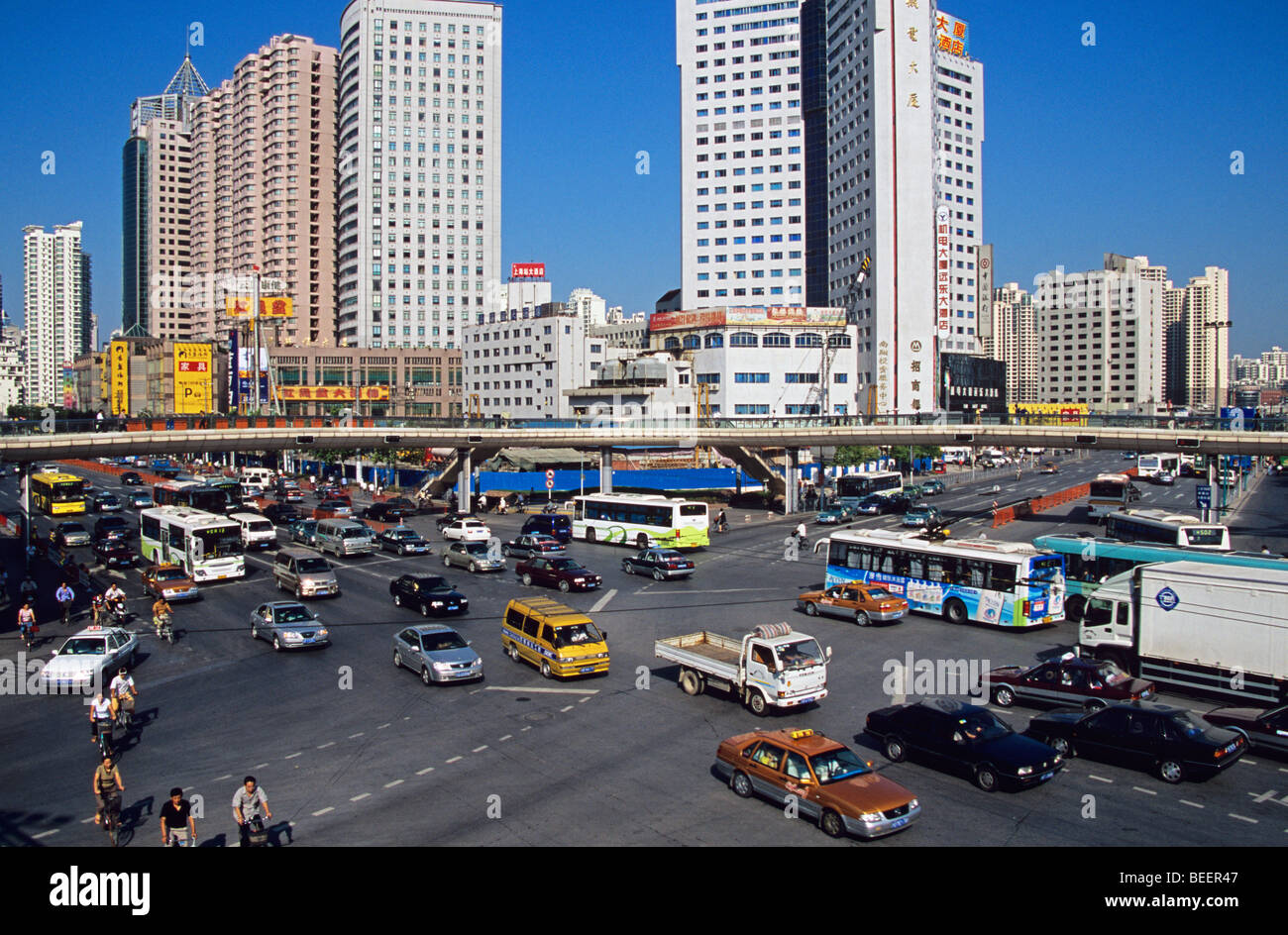 Shanghai - Busy road intersection near the Shanghai Railway Station ...