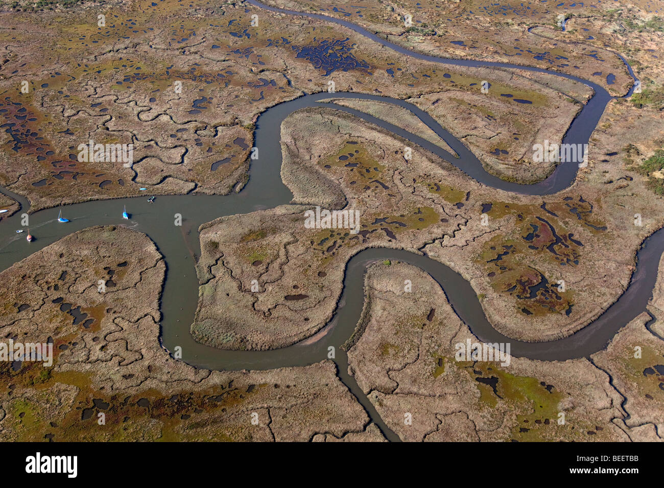 Aerial landscape showing the intertidal zone of creeks and saltmarsh ...