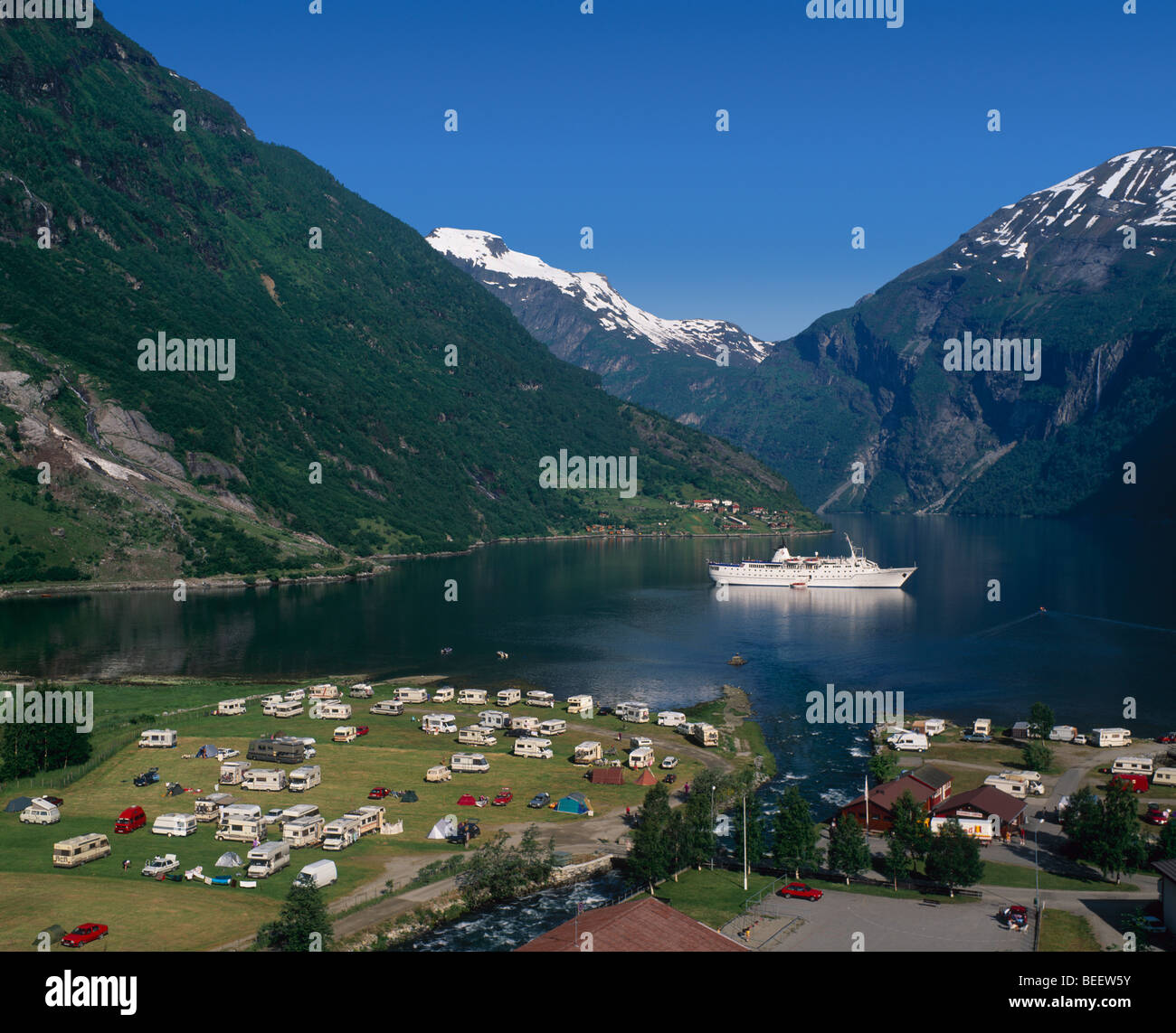 Campsite and cruise ship at Geiranger Geirangerfjord Norway Stock Photo ...