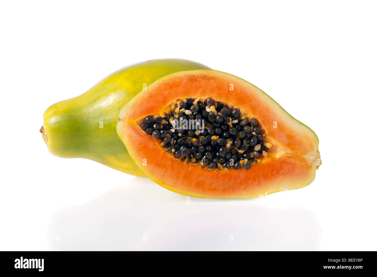 Two papayas Cut Out Stock Images & Pictures - Alamy