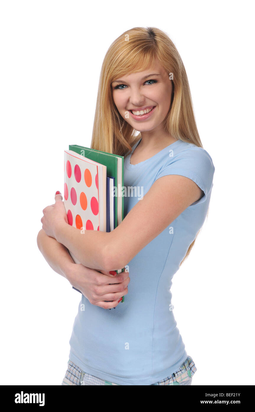 Portrait of teen holding books isolated on a white background Stock ...