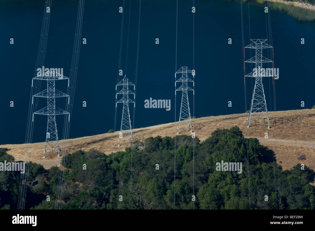 aerial view above power transmission lines towers at California ...