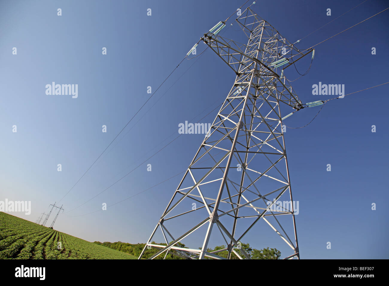 High voltage tower in the field Stock Photo - Alamy