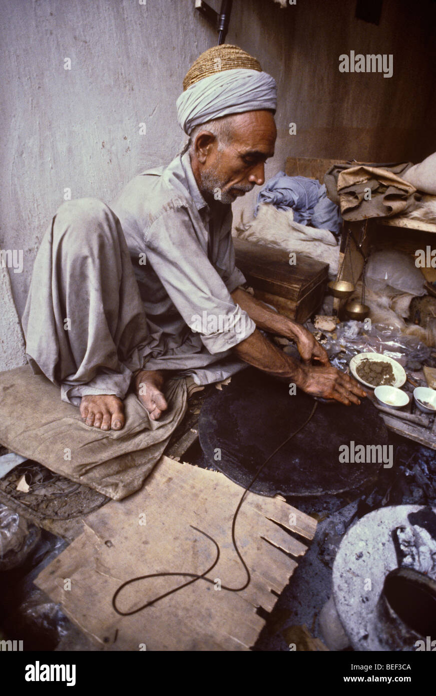 Men cooking hashish in drug shop at Landi Kotal, Pakistan Stock Photo ...