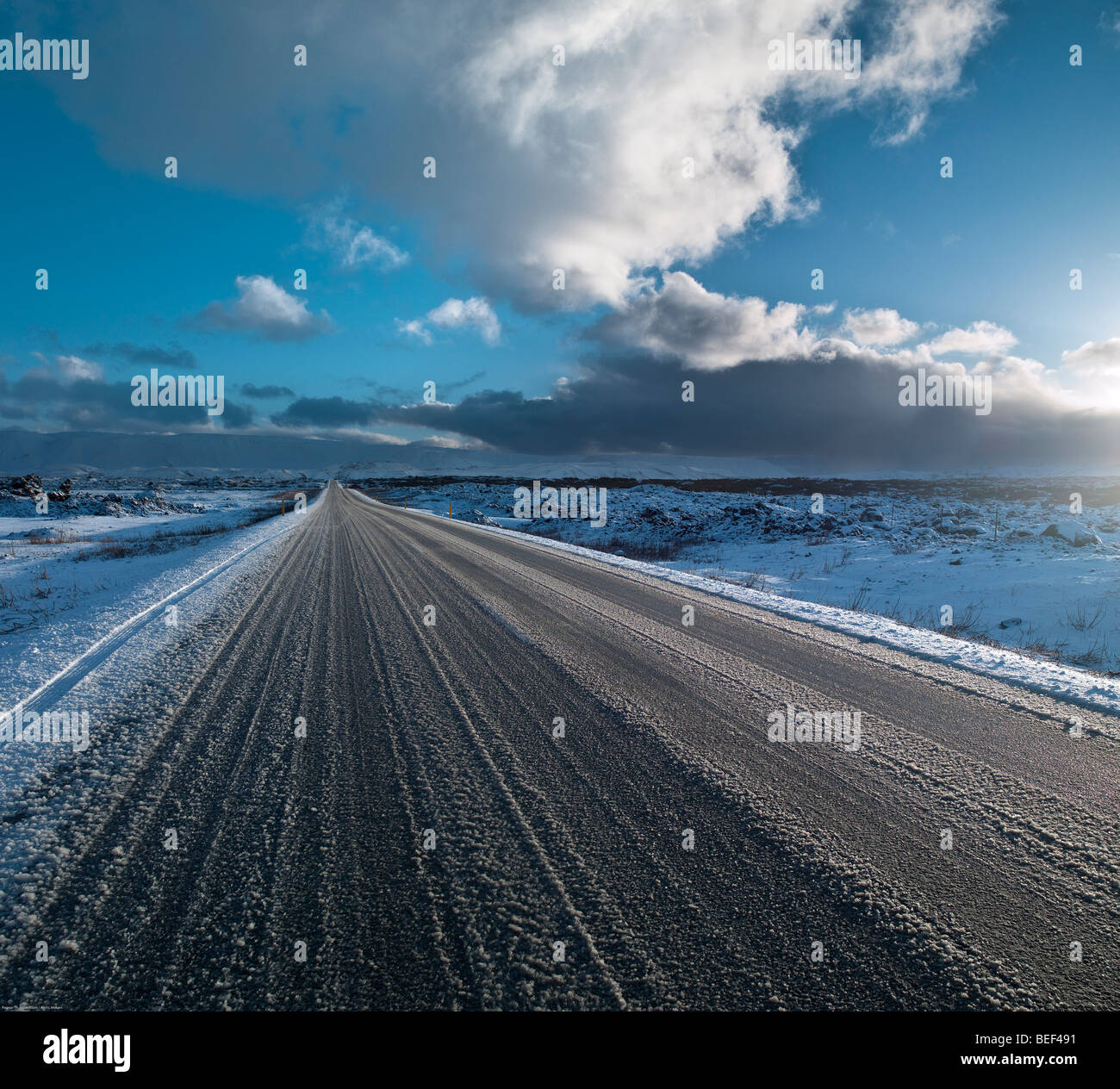 Empty road snow covered mountains hi-res stock photography and images ...