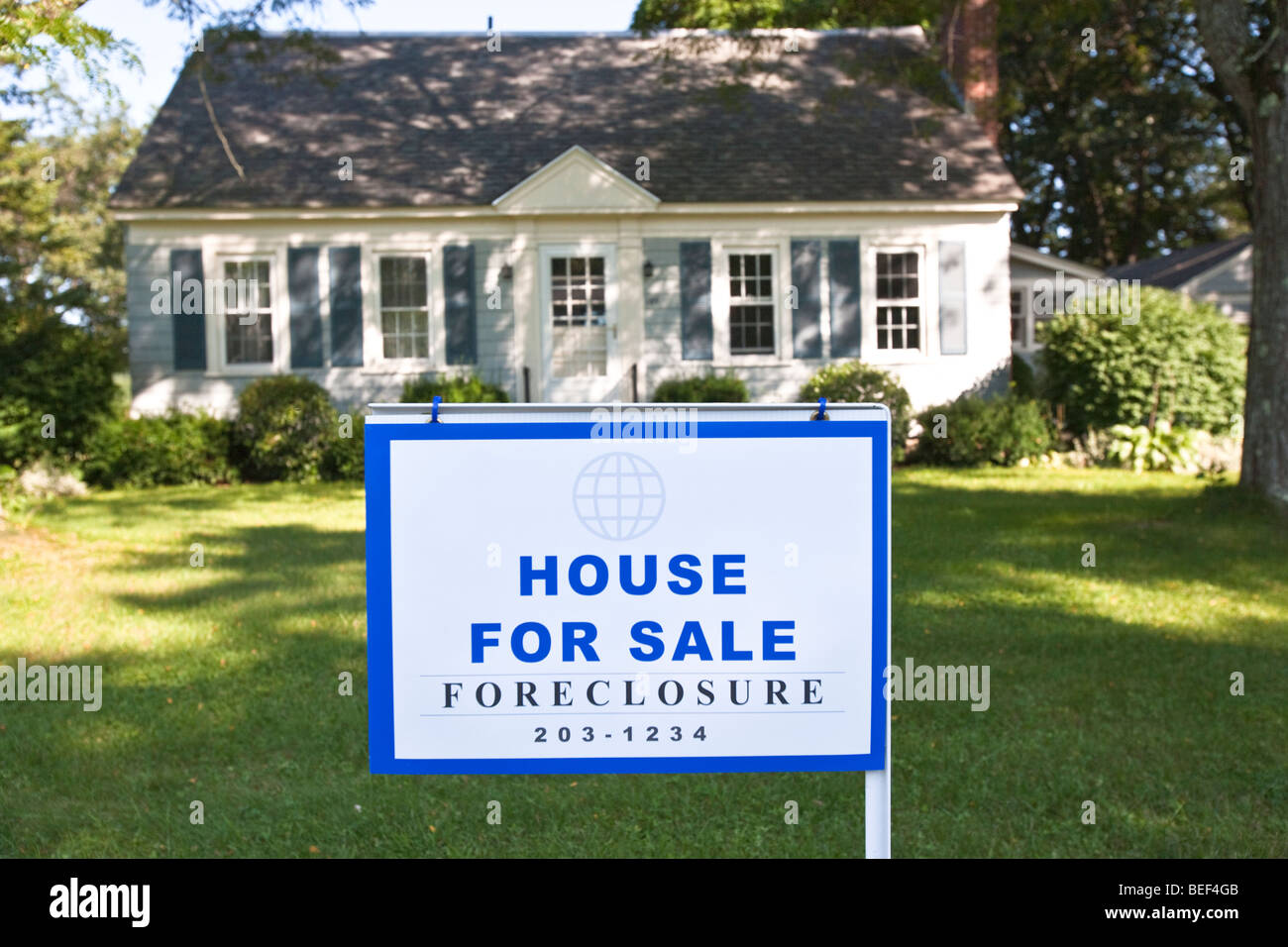House with foreclosure bank owned sign hi-res stock photography and ...