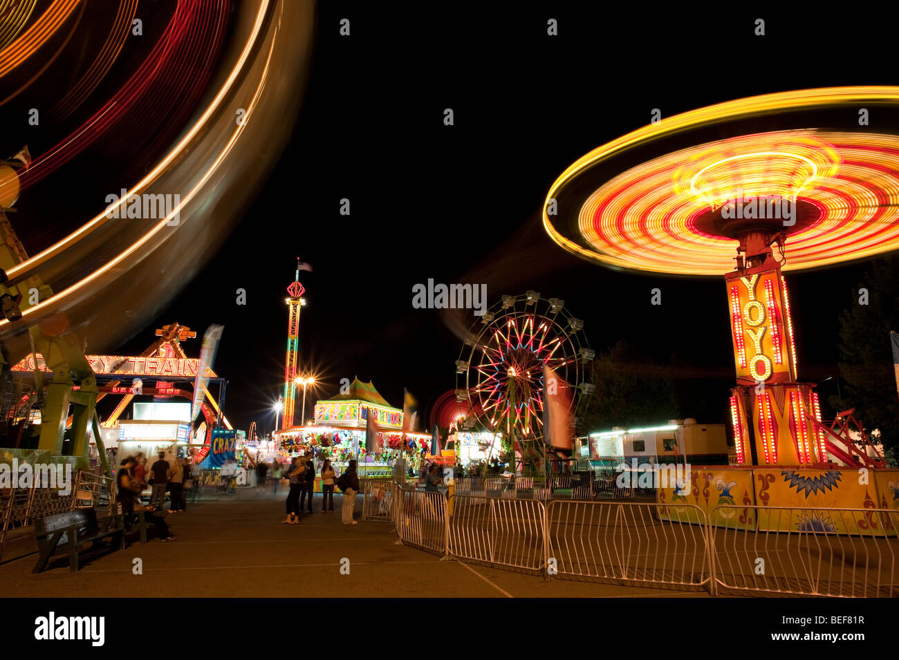 Evergreen State Fair people enjoying the amusement rides and game ...