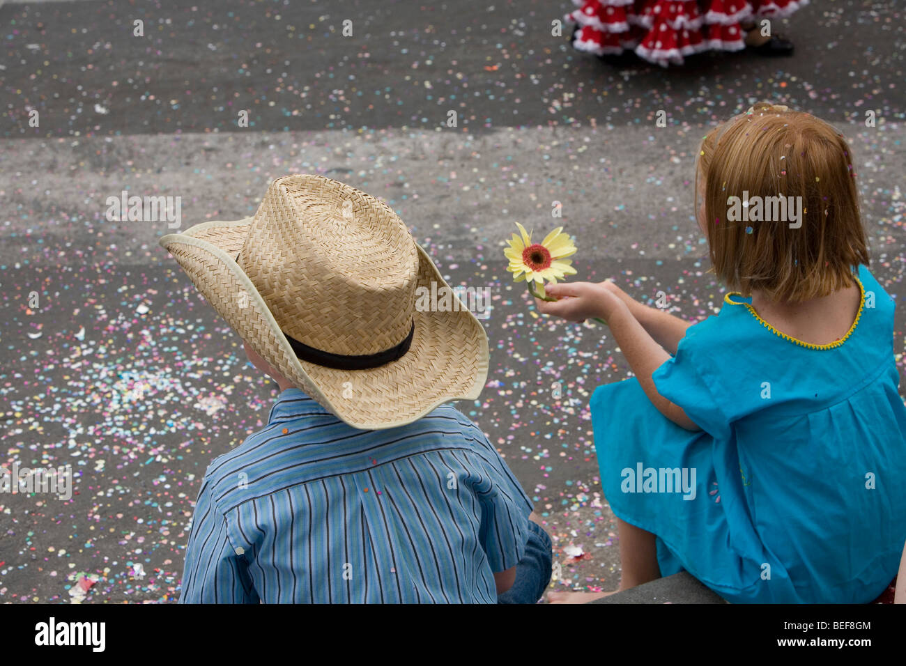 Kids watching Fiesta Parade Stock Photo - Alamy