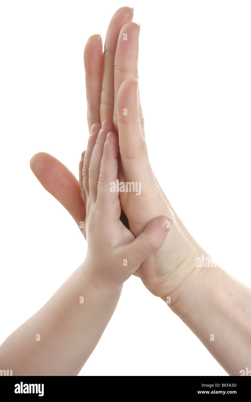 Mother and son, daughter hand together love family sign Stock Photo - Alamy