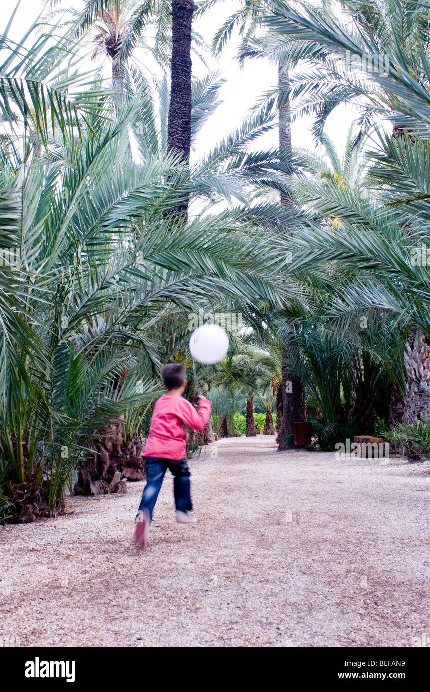 boy running elche spain Stock Photo - Alamy