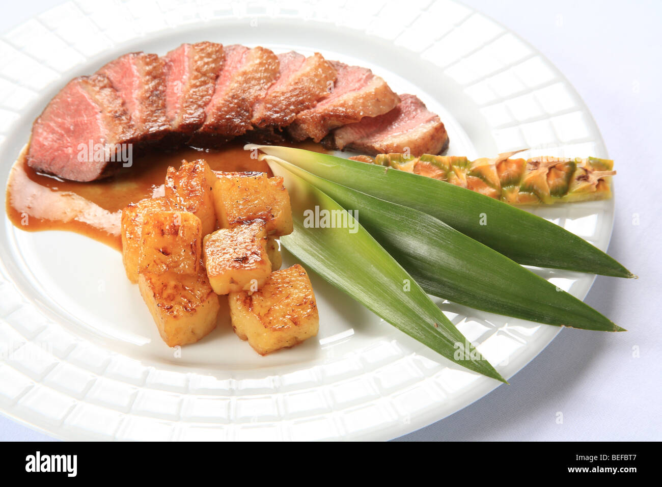 Steak with pineapple Stock Photo - Alamy