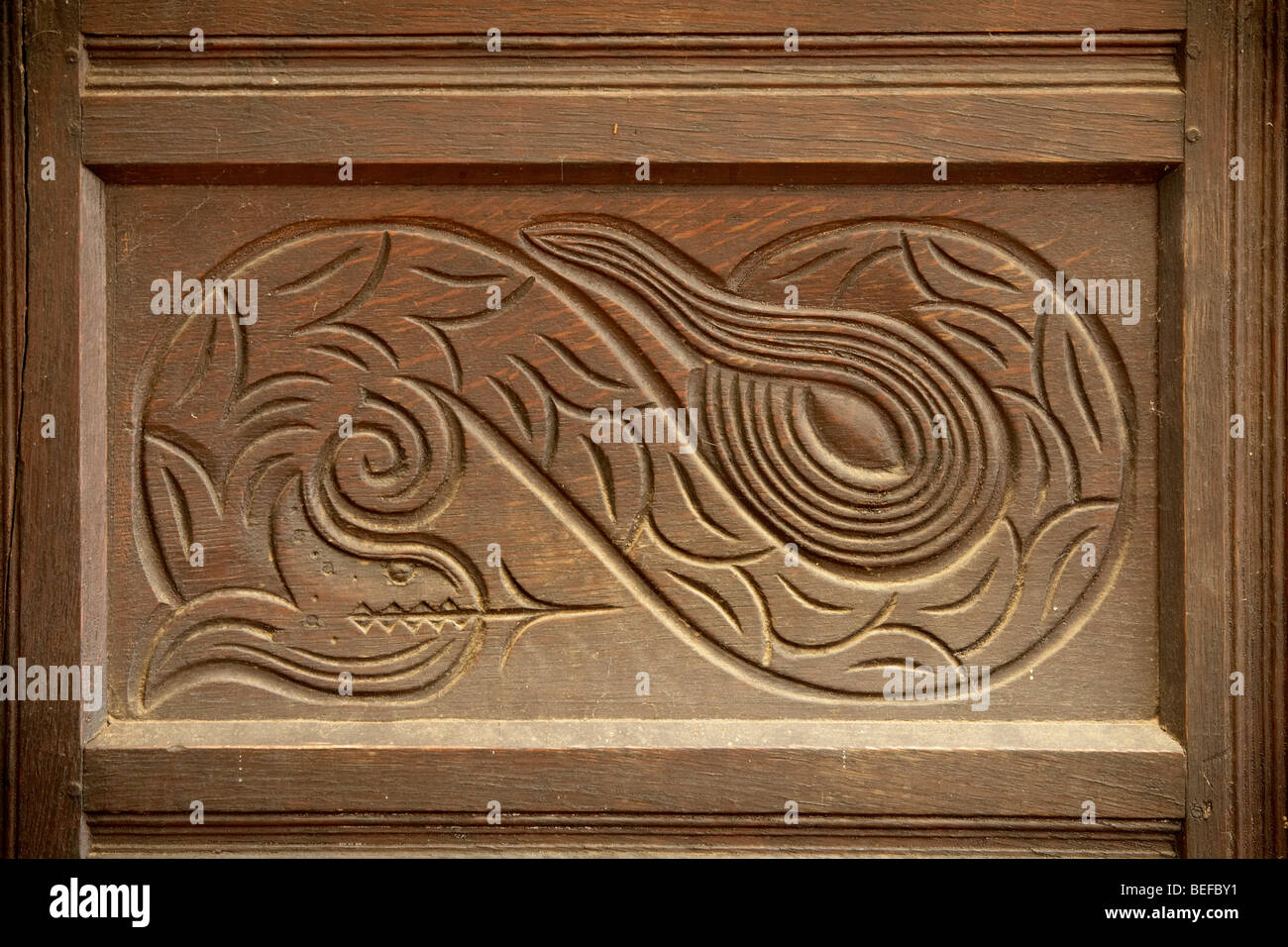 Wood carving of a Snake Stock Photo - Alamy