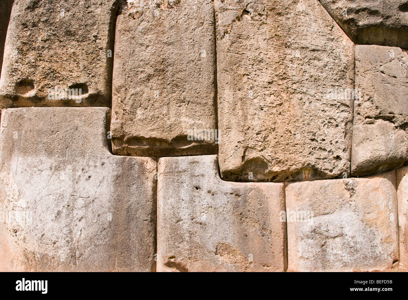 Tightly fit stones in an ancient wall built by the Inca at Sacsayhuaman ...