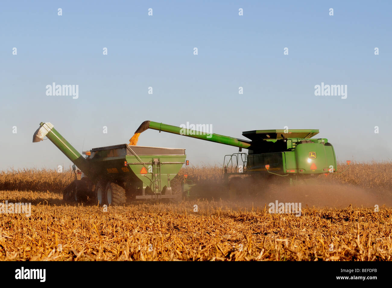A John Deere combine harvests corn Stock Photo - Alamy