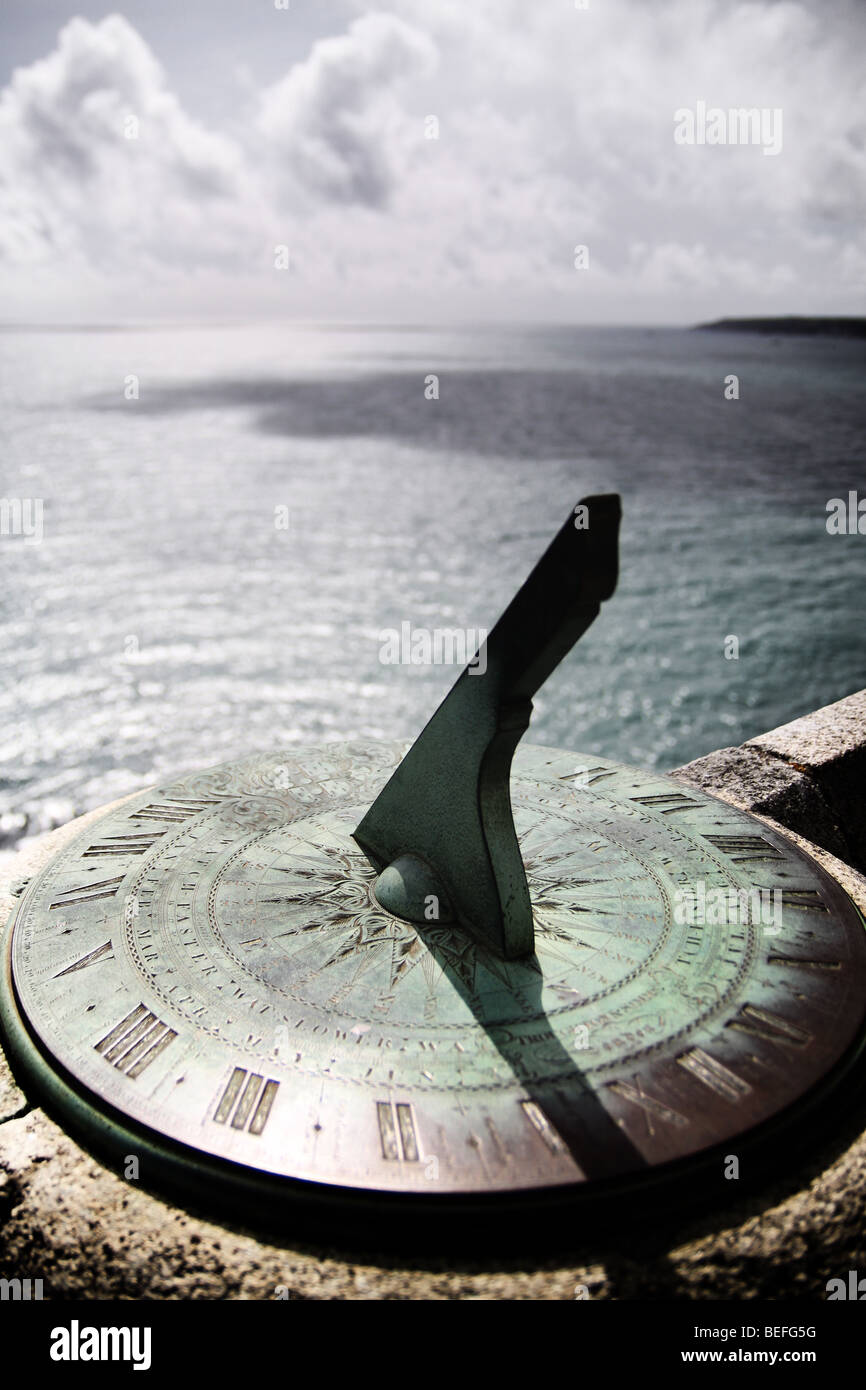 sundial by the sea Stock Photo - Alamy