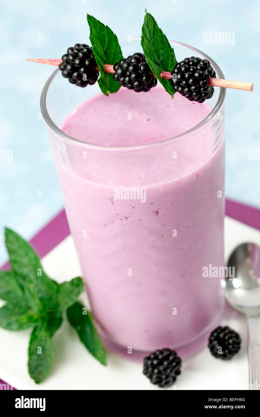 Soybean milkshake with blackberries Recipe available Stock Photo - Alamy