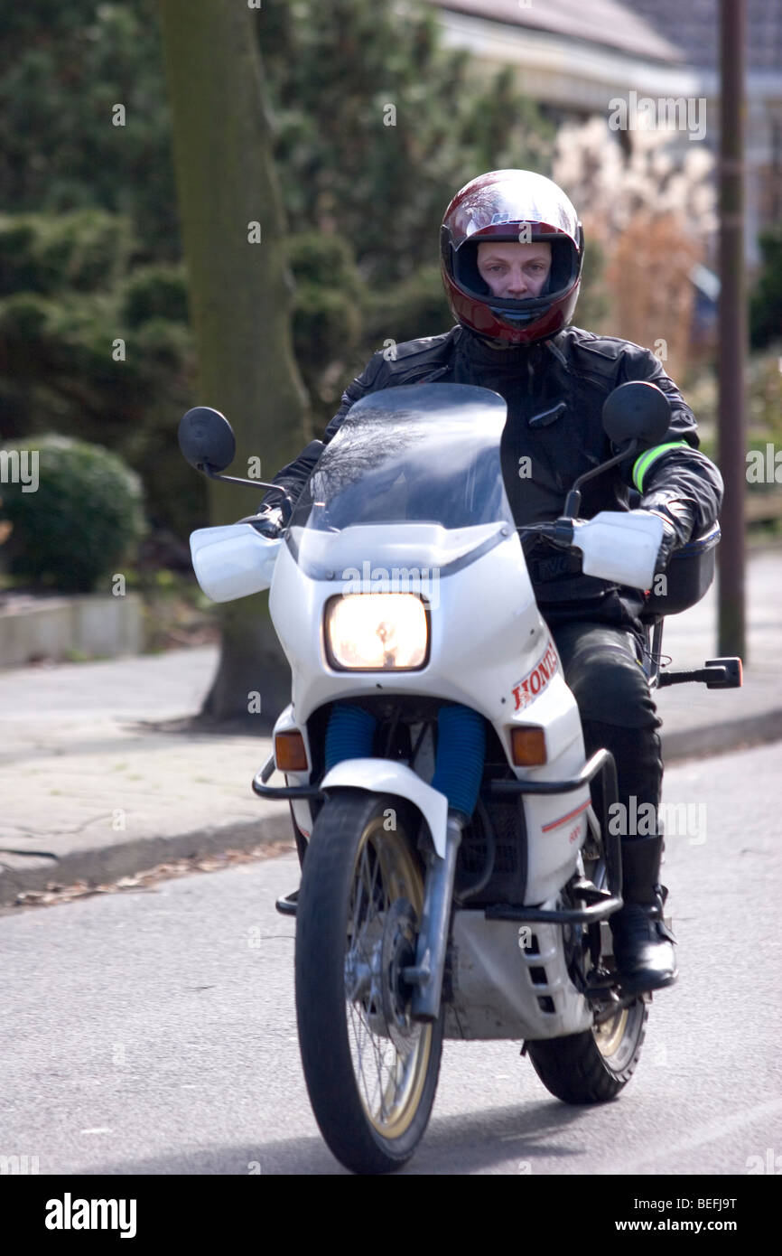 Adult man riding a motorcycle - SerieCVS417203 Stock Photo - Alamy