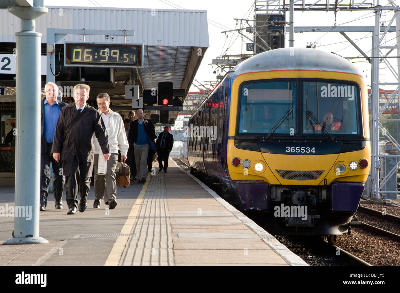 Class 365 train in First Capital Connect livery and passengers waiting ...