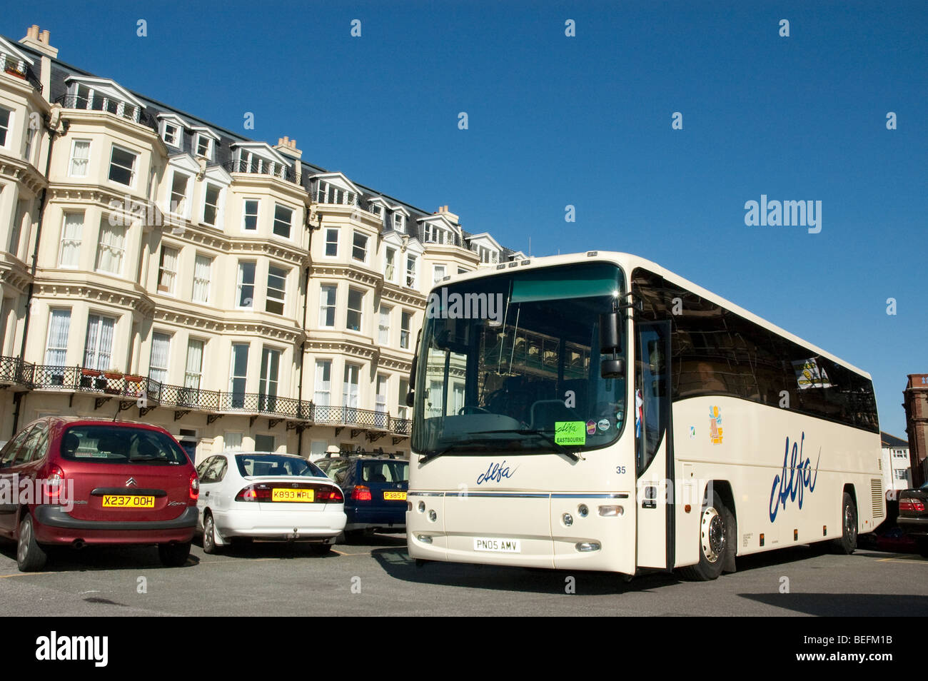coach parked outside hotel preparing to depart on day trip Stock Photo ...