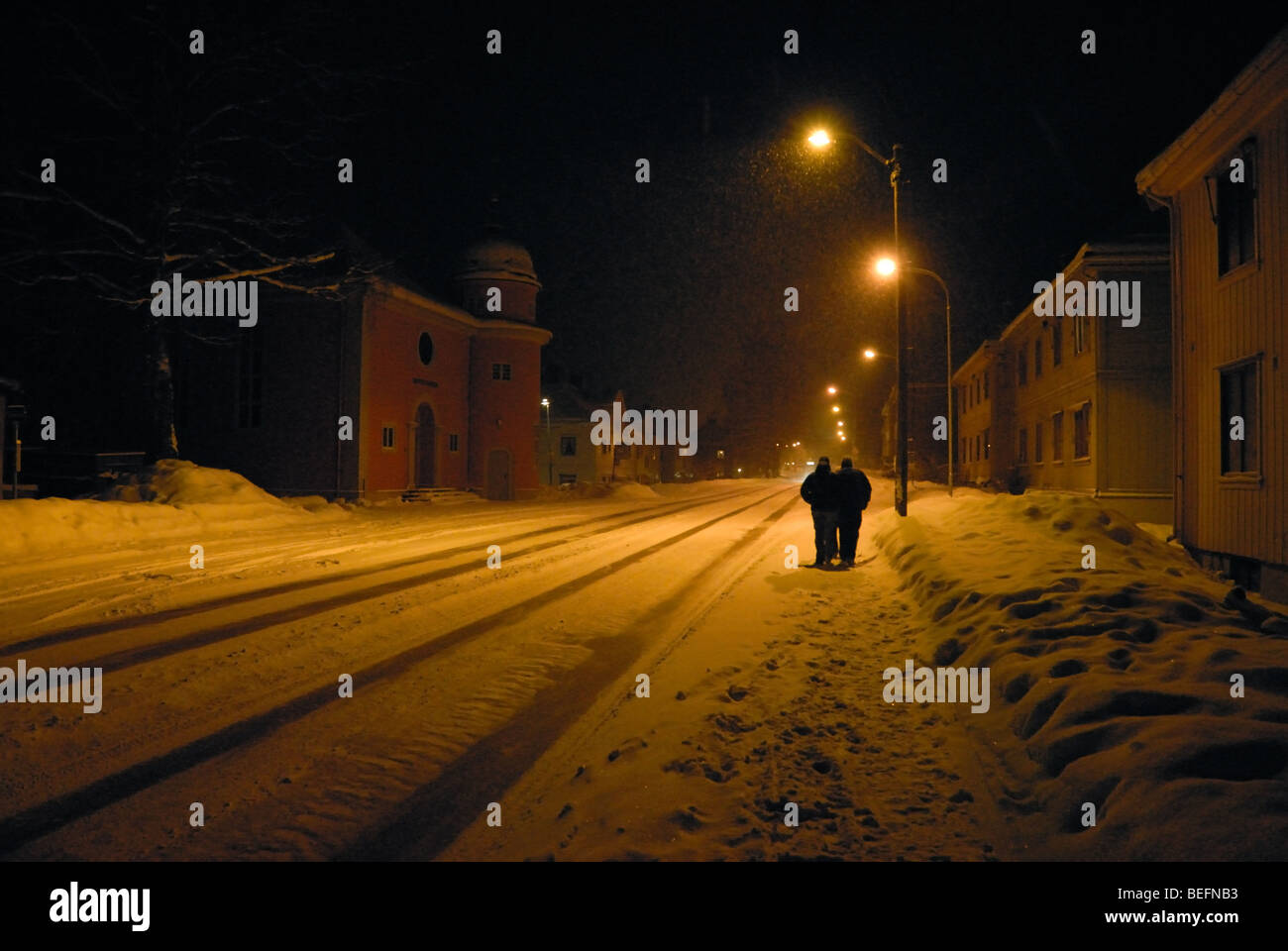 Snowy City Street At Night