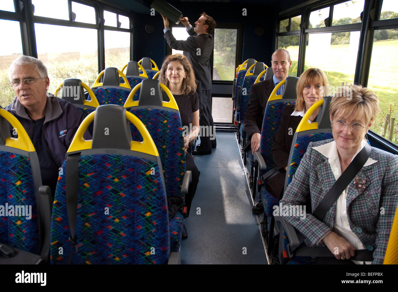business men and women in an executive small bus Stock Photo - Alamy