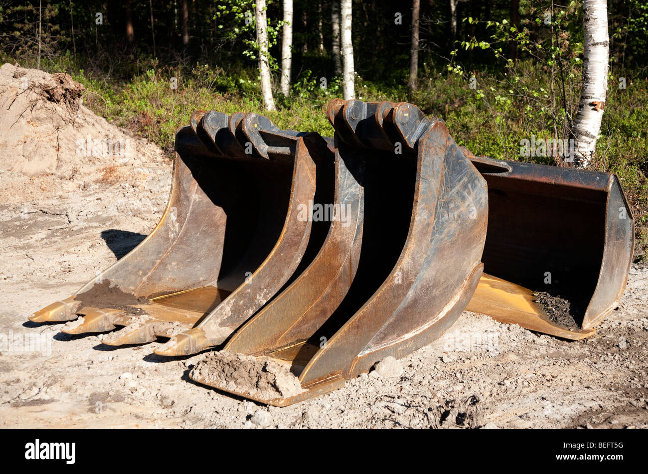 Different digger buckets , Finland Stock Photo - Alamy