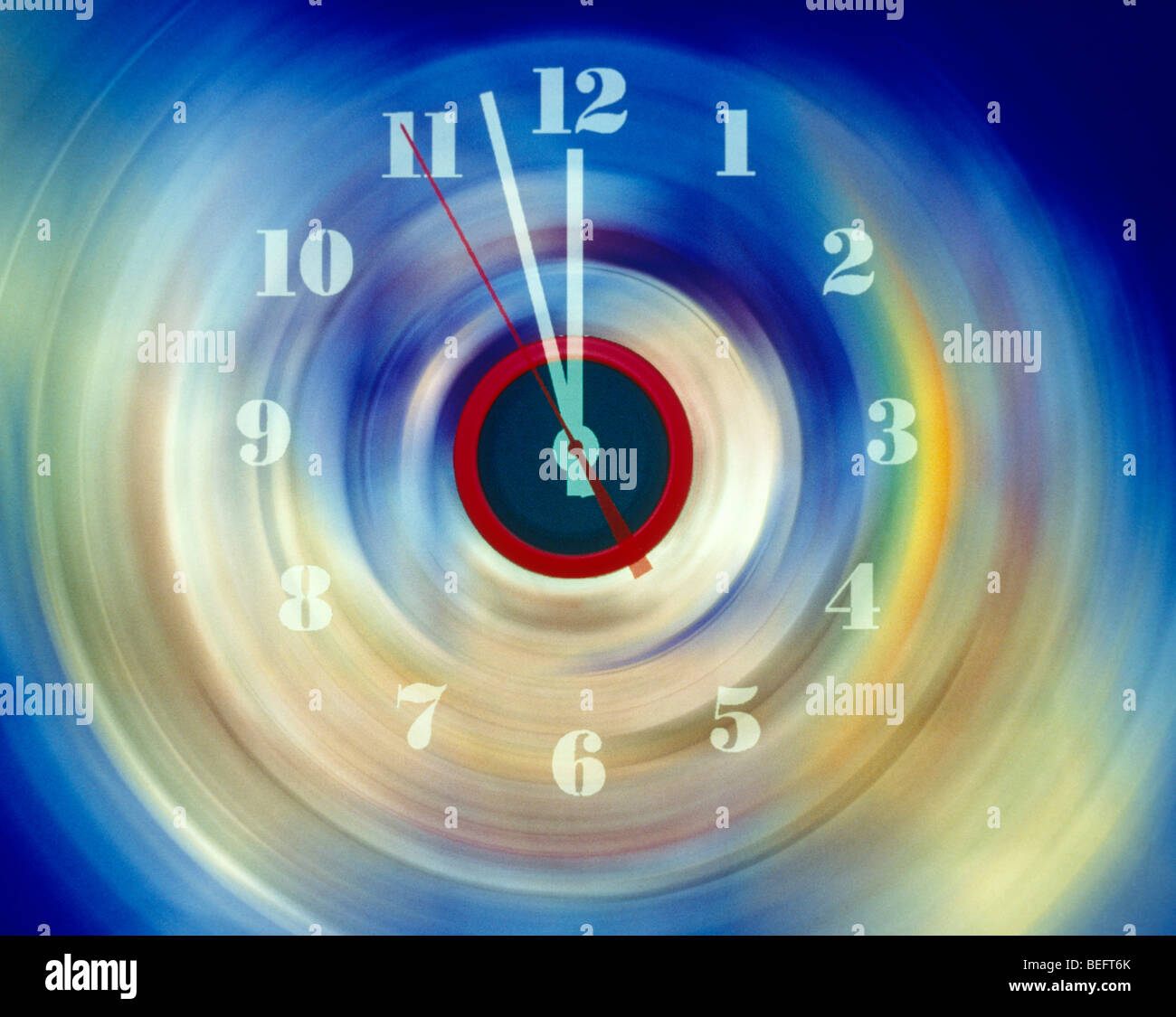 Graphic image with a colourful clock Stock Photo - Alamy