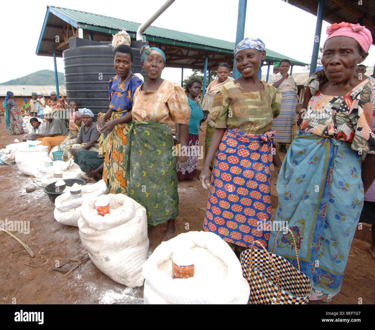 Bakonzo women selling flour in market town, Rwenzori Mountains, West ...