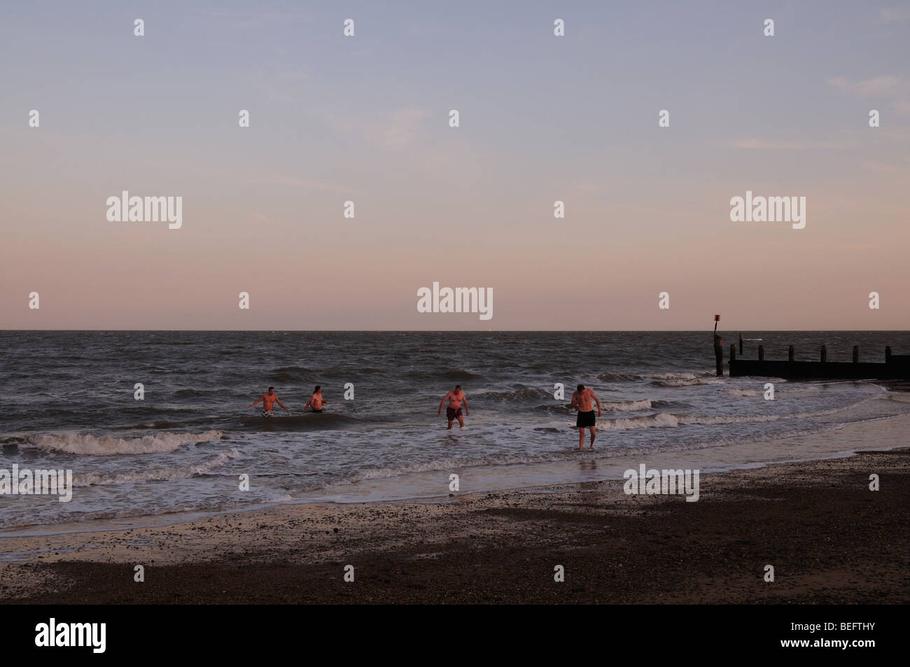In The Sea Southwold at sunset Suffolk Stock Photo - Alamy