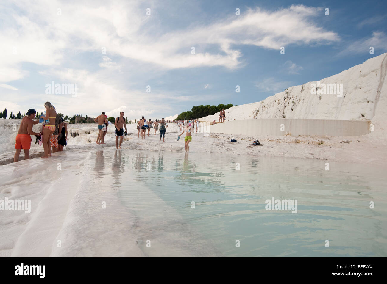 Group of people visiting Pamukkale's calcium terraces Stock Photo - Alamy