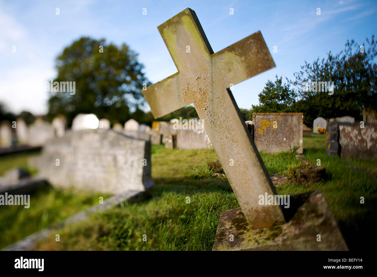 Leaning cross in graveyard hi-res stock photography and images - Alamy