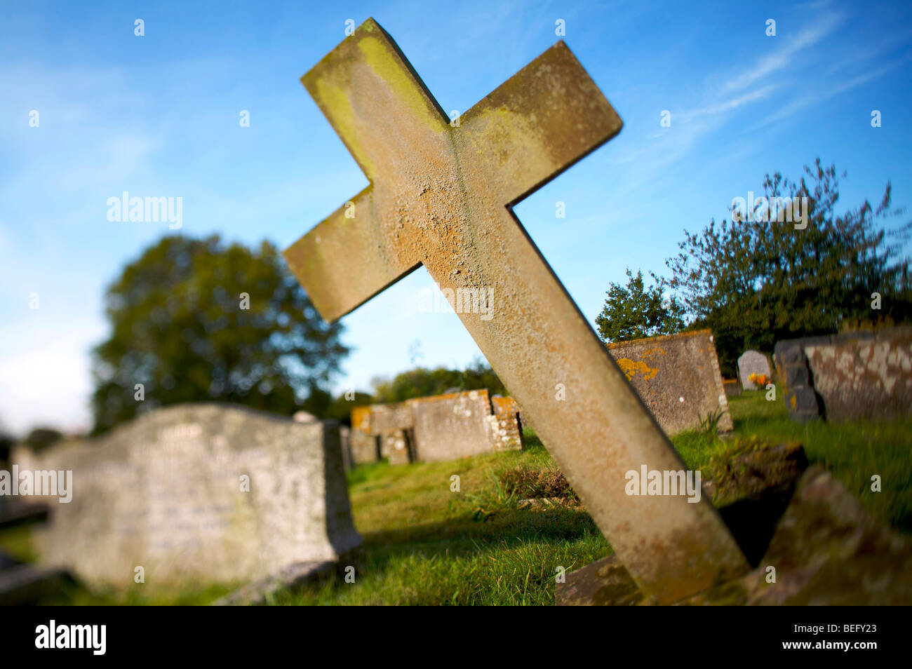 Leaning cross in graveyard hi-res stock photography and images - Alamy