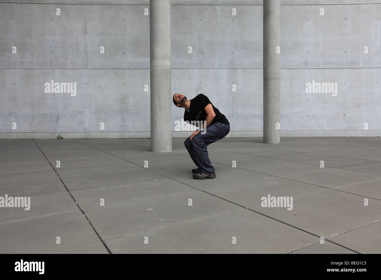 Crouching dance hi-res stock photography and images - Alamy