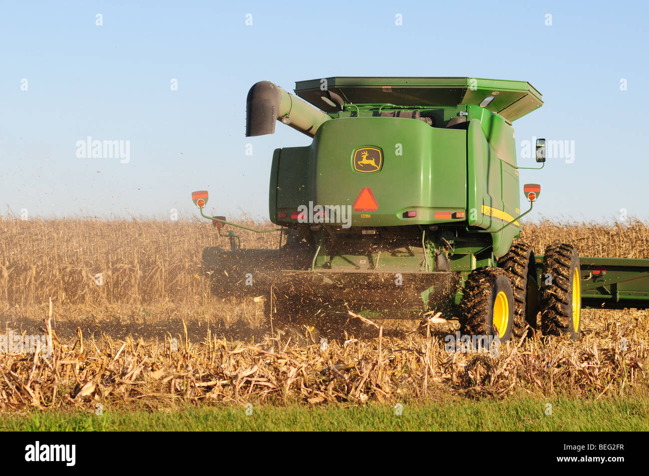 A John Deere combine harvests corn Stock Photo - Alamy