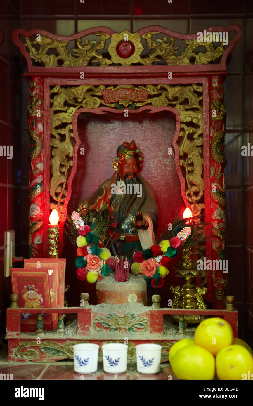 Buddha display in Chinese restaurant Stock Photo - Alamy