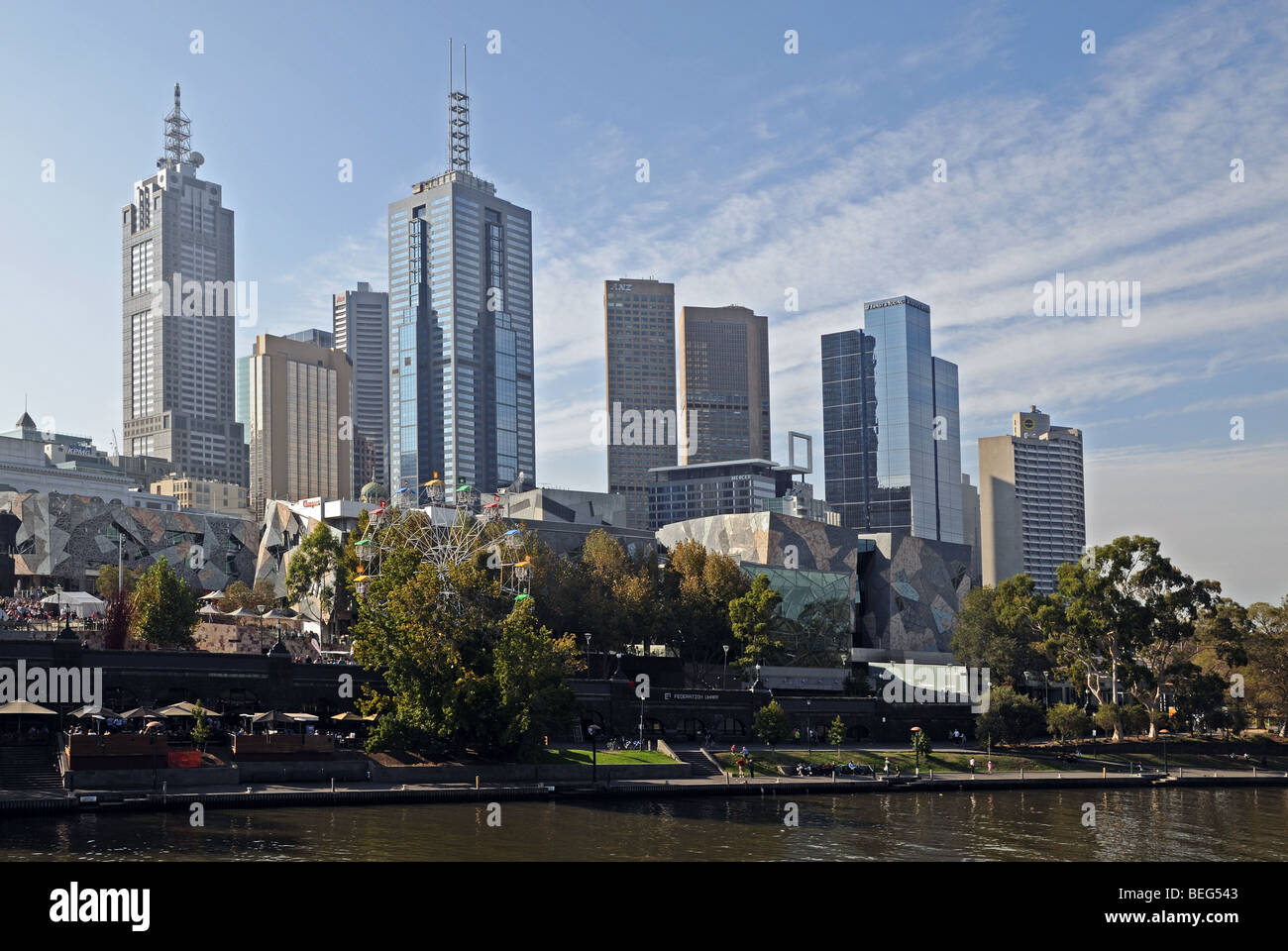 High rise buildings skyscrapers and Federation Square with Ferris Wheel ...
