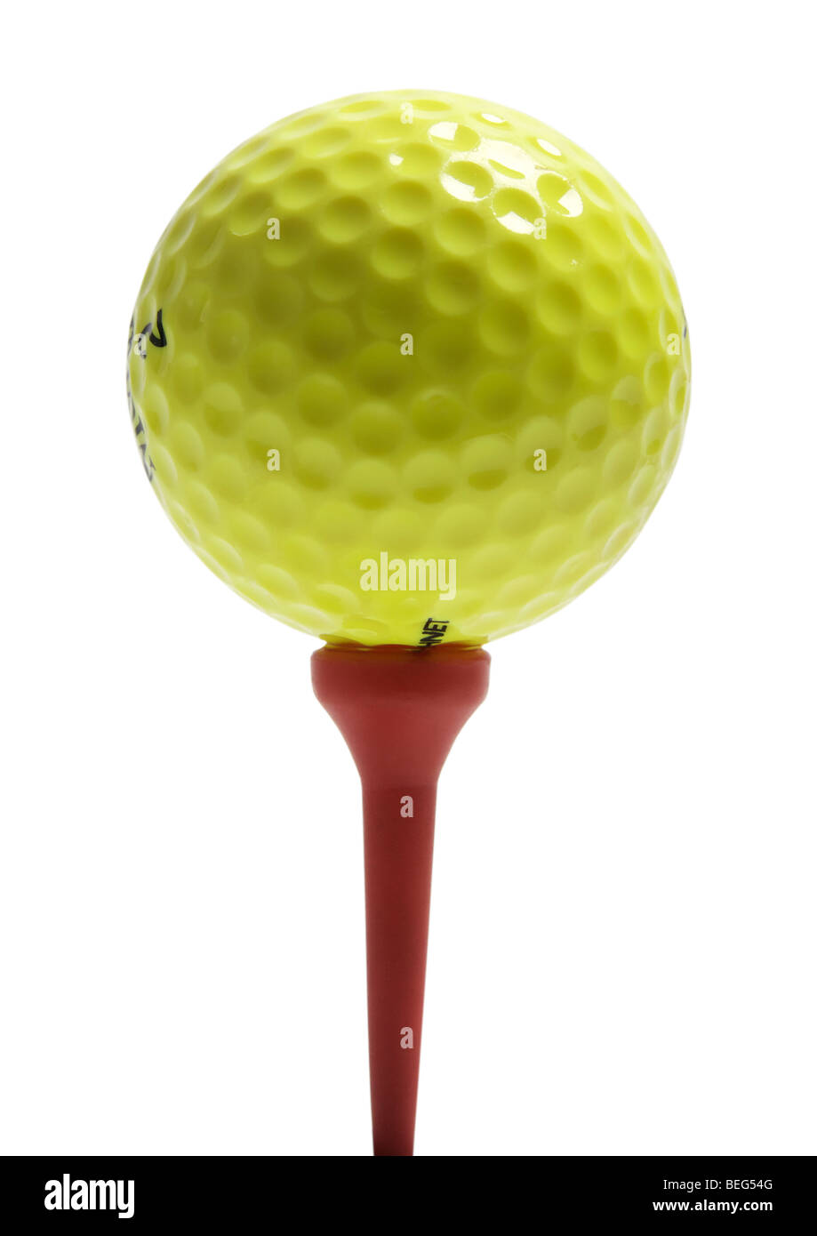 Golf ball and tee on white background Stock Photo - Alamy