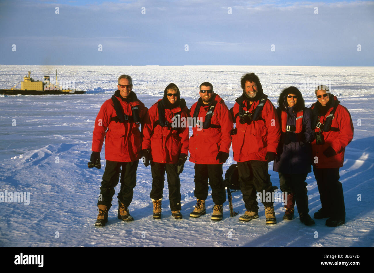 Tourists on top of Tabular Iceberg with Russian Icebreaker, Kapitan ...