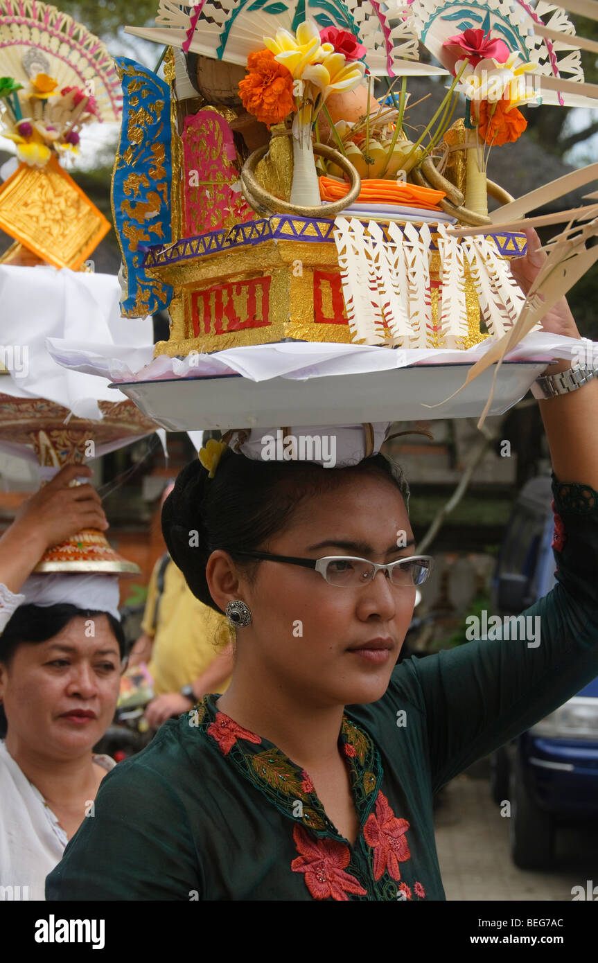 woman taking part in a traditional funeral and cremation ceremony in ...