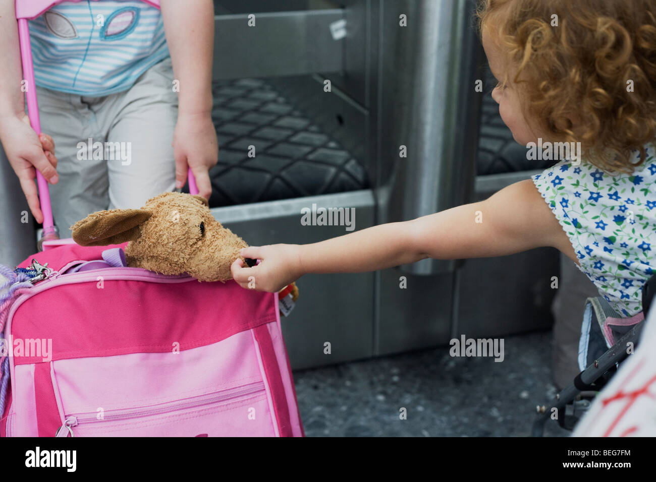 Children experiencing pre-holiday excitement in check-in areas at ...