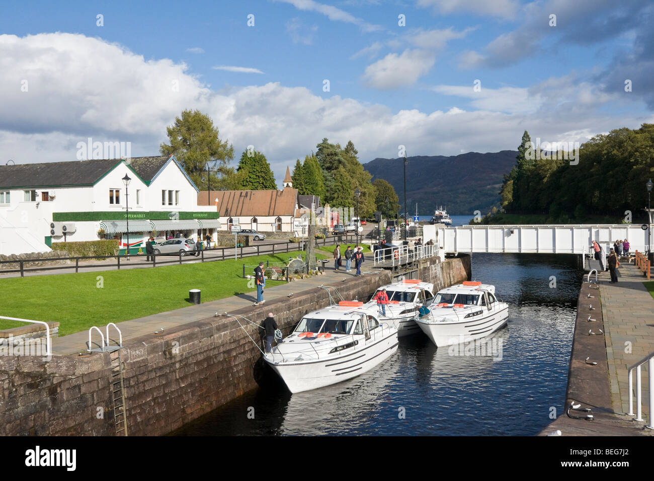 Pleasure motor vessels passing through the Caledonian Canal in Fort ...