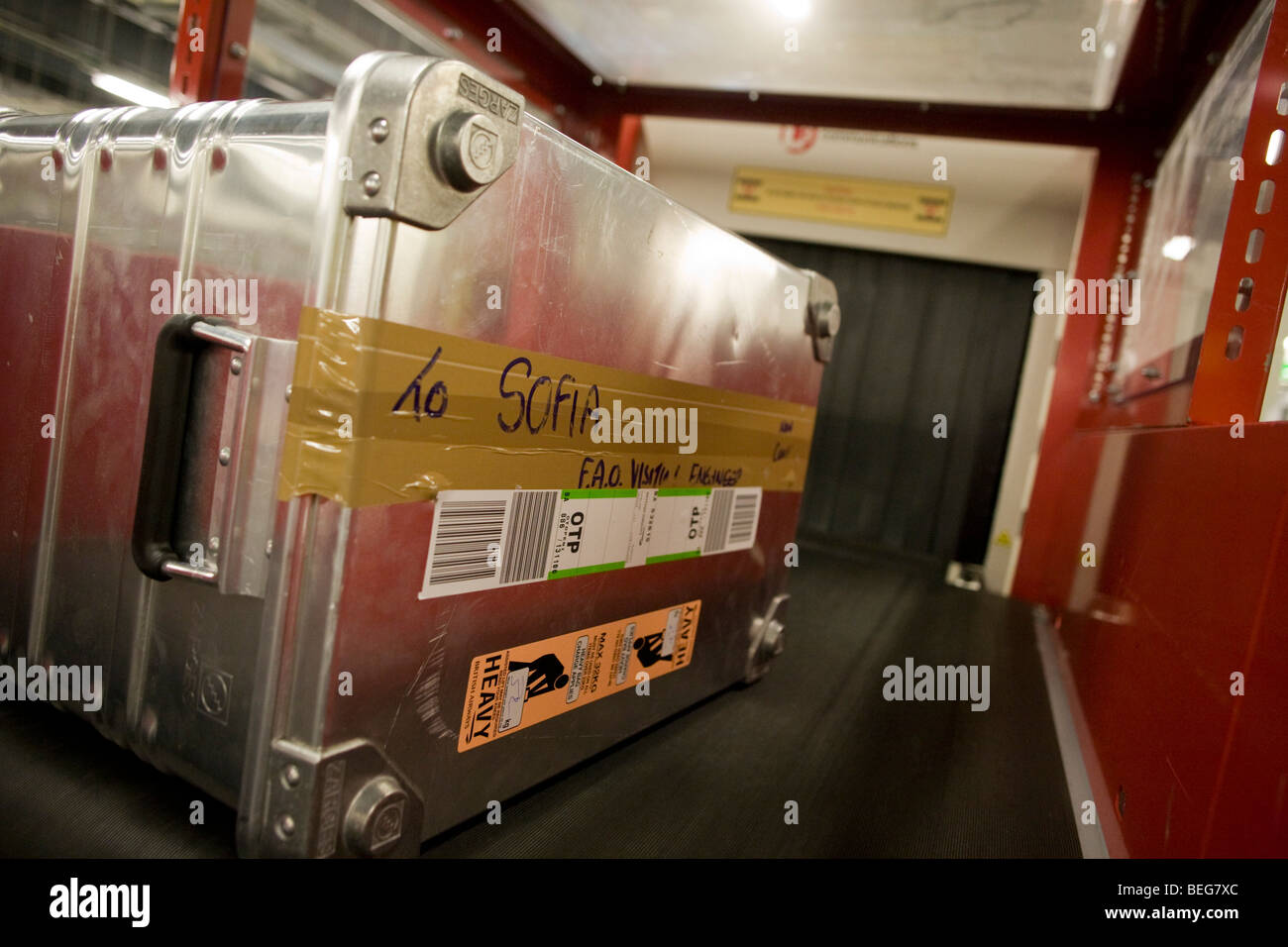 Baggage enters an x-ray machine within the 11 miles of conveyor belts ...