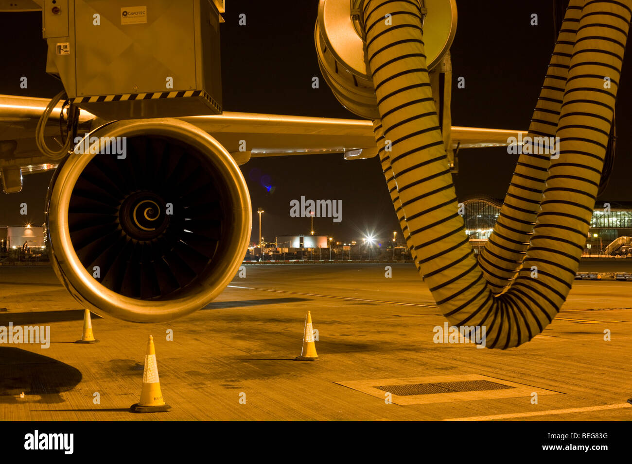 Traffic cones, a Boeing engine and pre-conditioned air duct during an ...