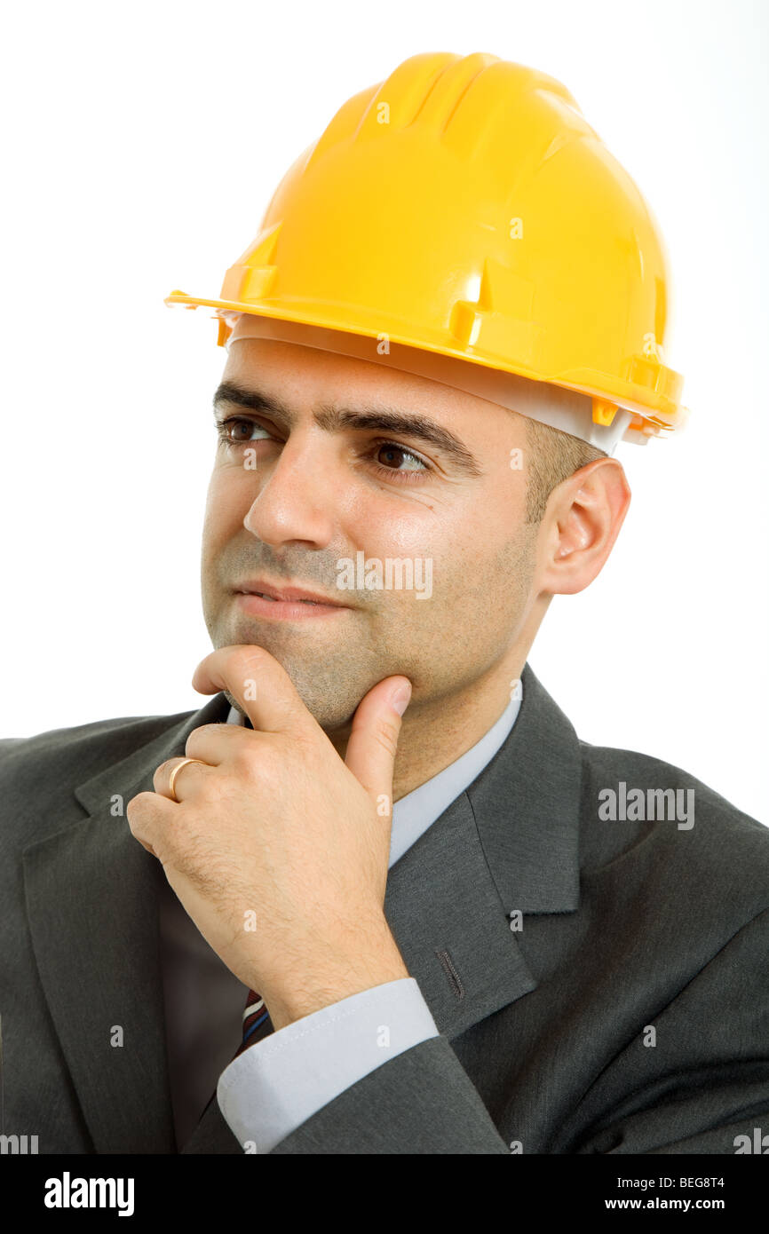 An engineer with yellow hat, isolated on white Stock Photo - Alamy