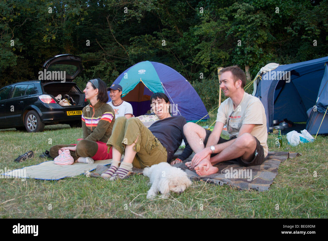 People enjoying camping Stock Photo - Alamy