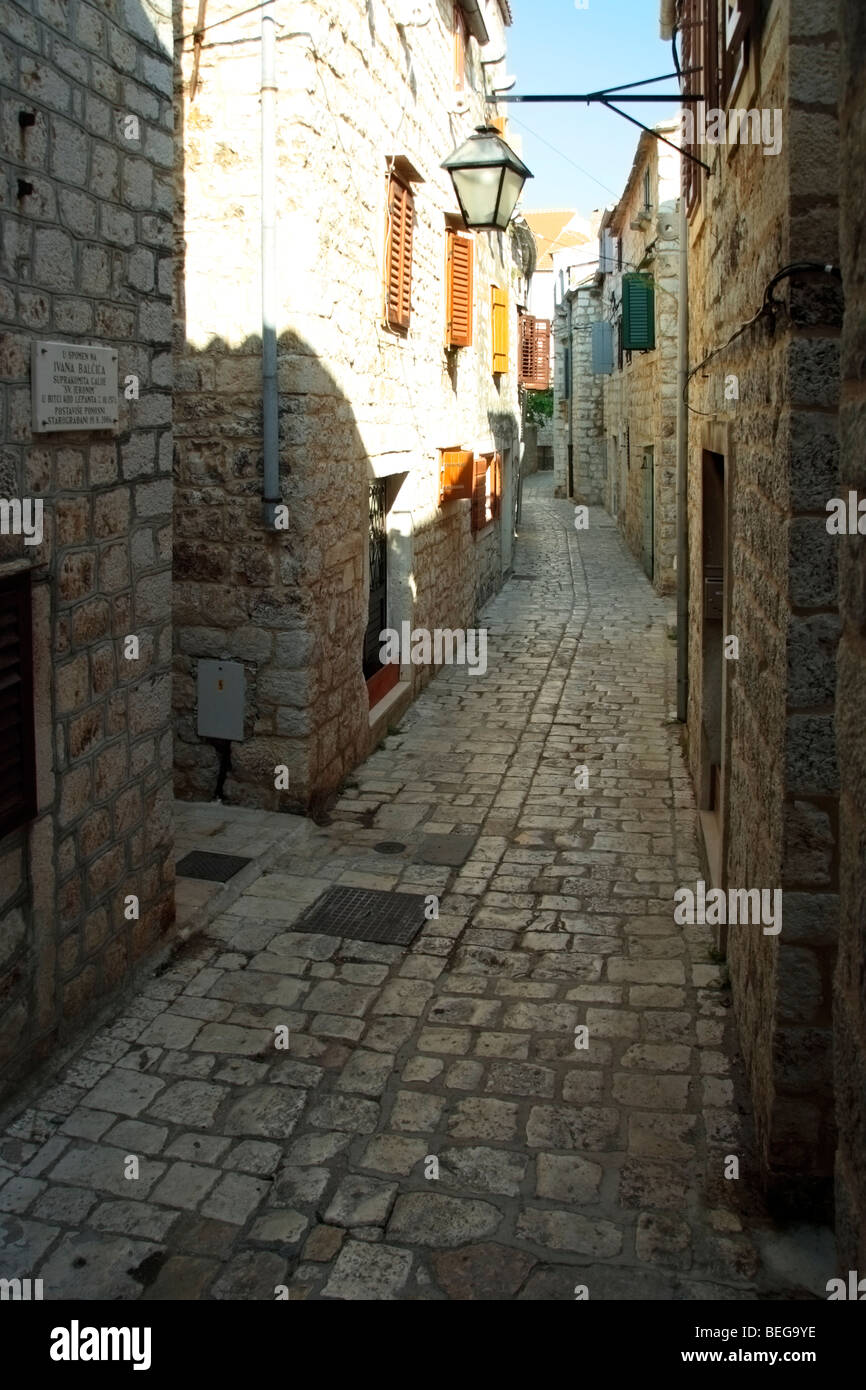 Old town narrow street in Stari Grad on Hvar Island, Croatia Stock ...