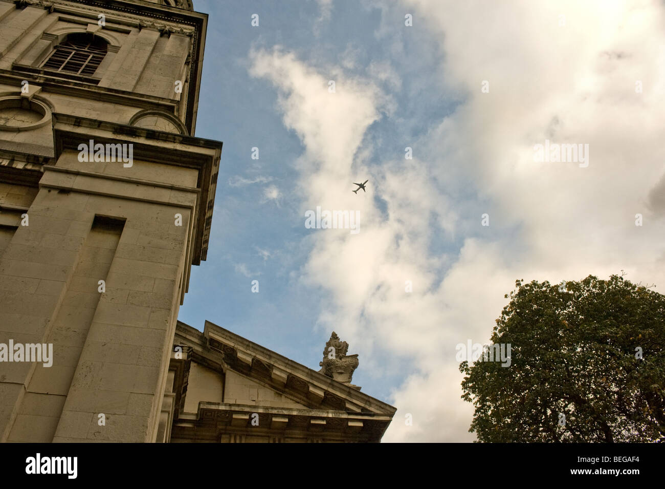 Plane over church hi-res stock photography and images - Alamy