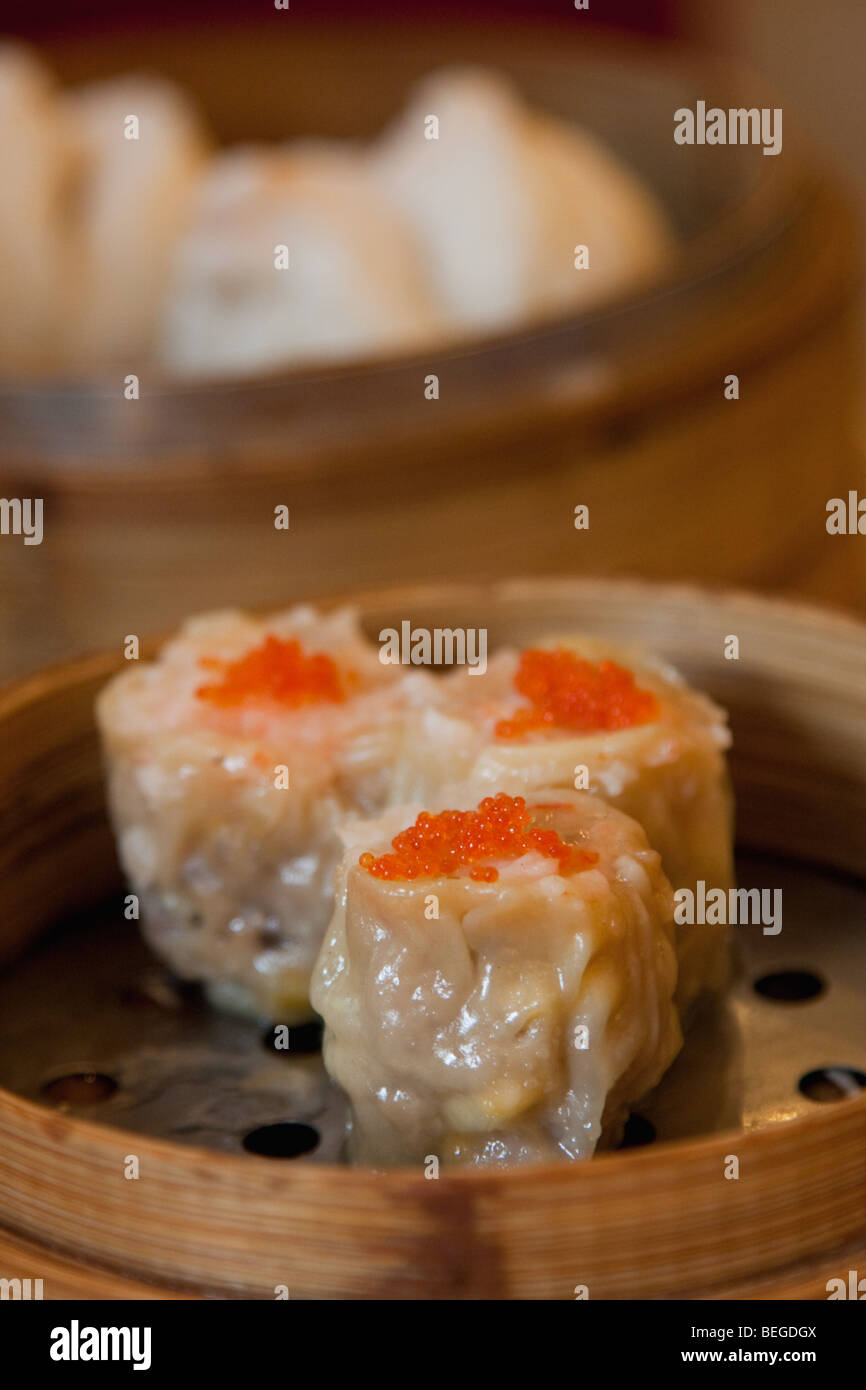 Steamed dumplings from a dim sum menu in a restaurant in Shanghai China ...