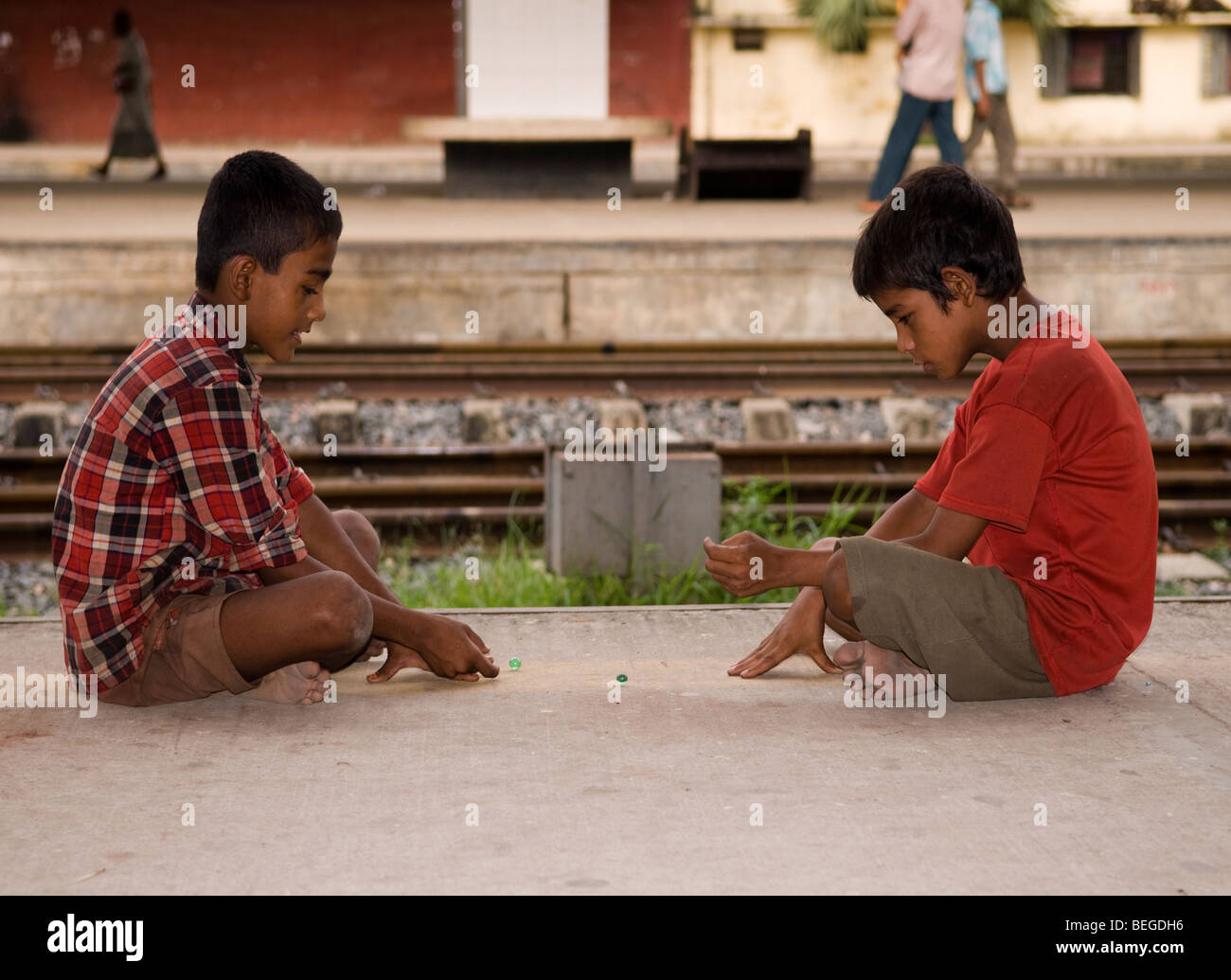Two young porters are playing in free time at Kamalapur Rail Station ...